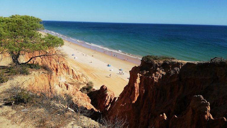Falesia Beach: Trekking through the cliffs on the most beautiful ...